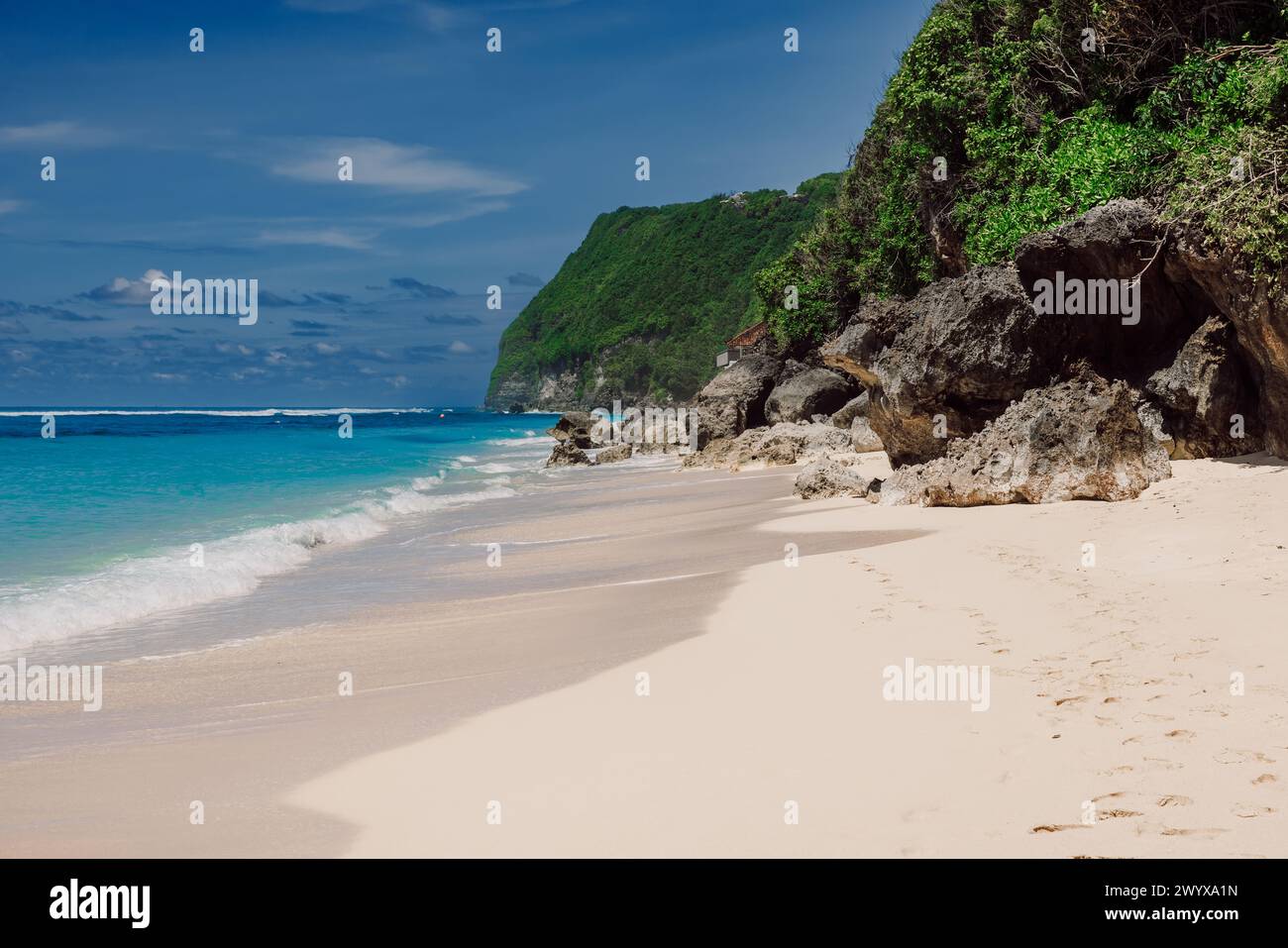 Luxury sandy beach in Bali with turquoise ocean. Popular Melasti beach ...