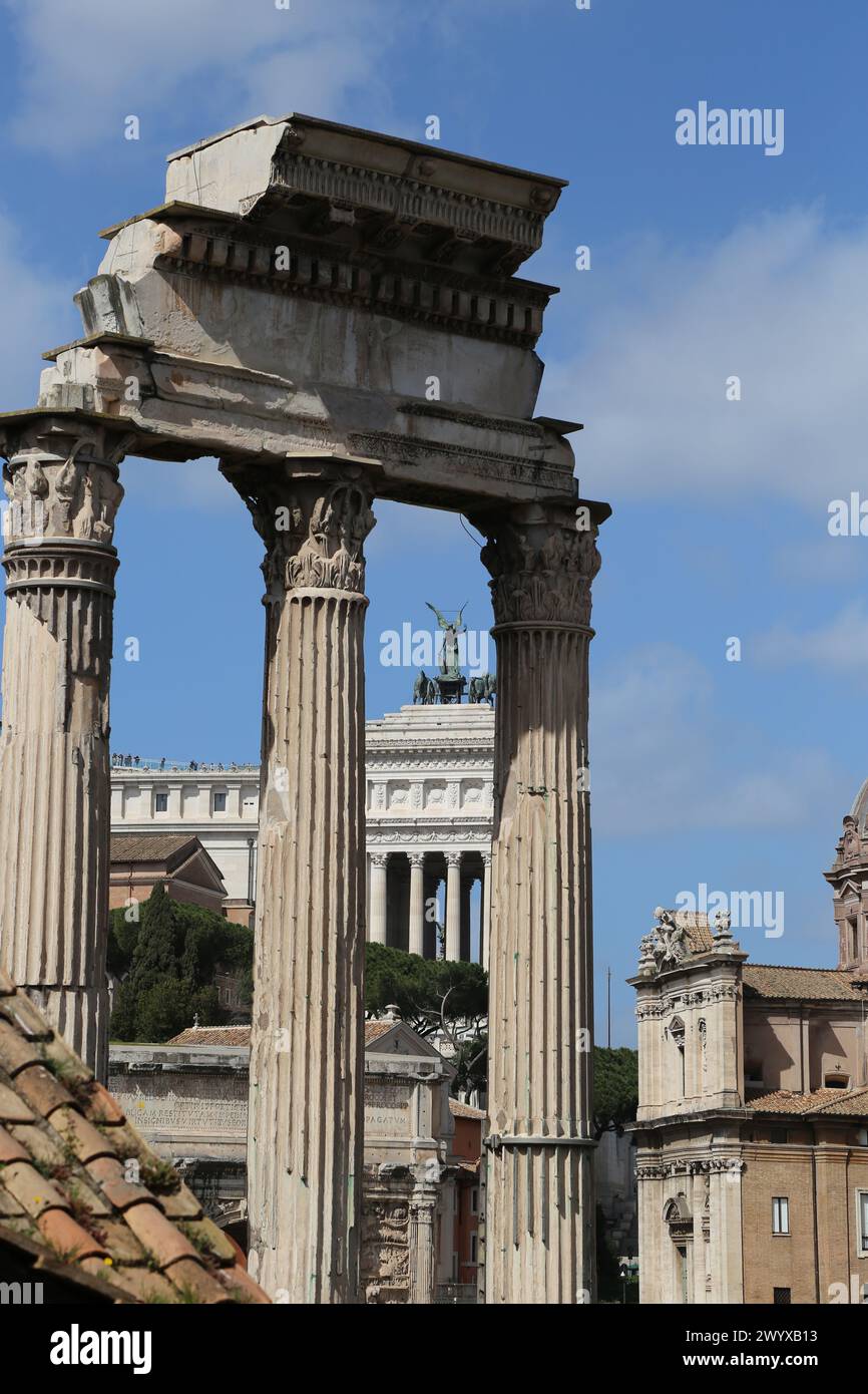 Remains of the Temple of Castor and Pollux in the Roman Forum with The Victor Emmanuel II ...