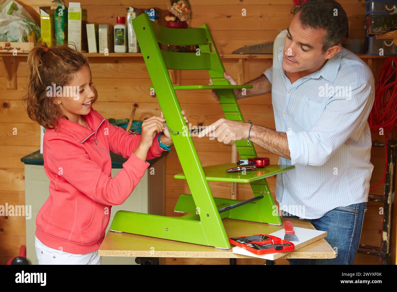 Parents and daughter diy hi-res stock photography and images - Alamy