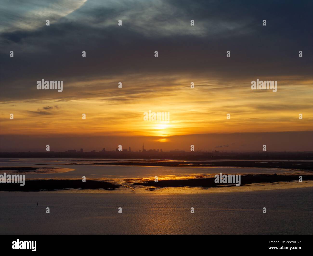 High elevation view of the sunset over Langstone Harbour and Farlington ...