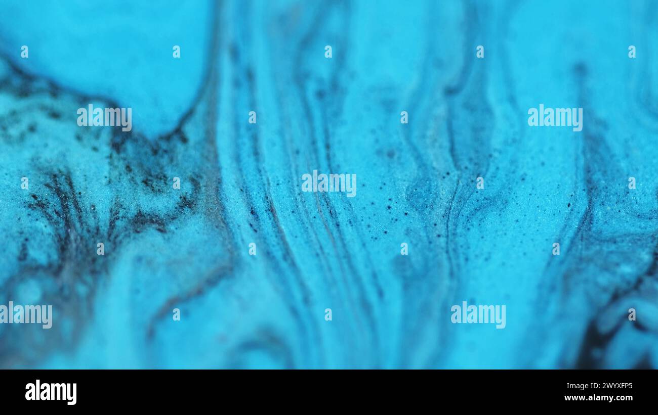 Ink drip flow. Glitter acryl texture. Blur bright blue black color wave ...