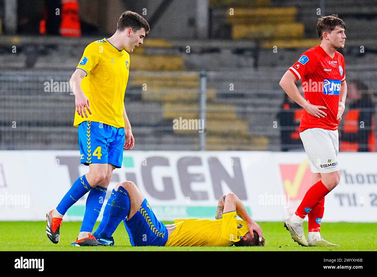 Daniel Wass, Broendby is injured in the Superliga match between ...