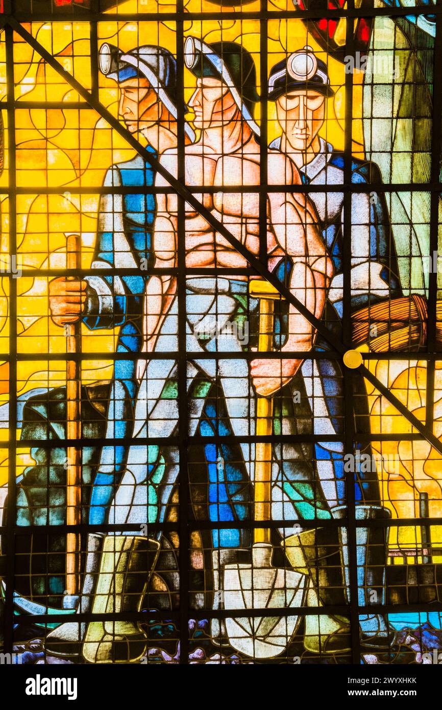 Detail of the industrial workers. Large stained glass window that ...