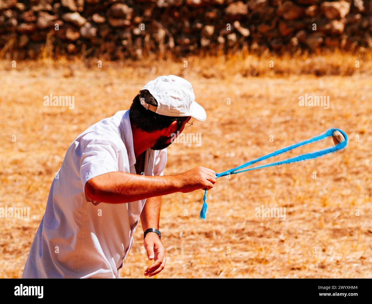 Shepherds sling demonstration. A sling is a projectile weapon typically ...