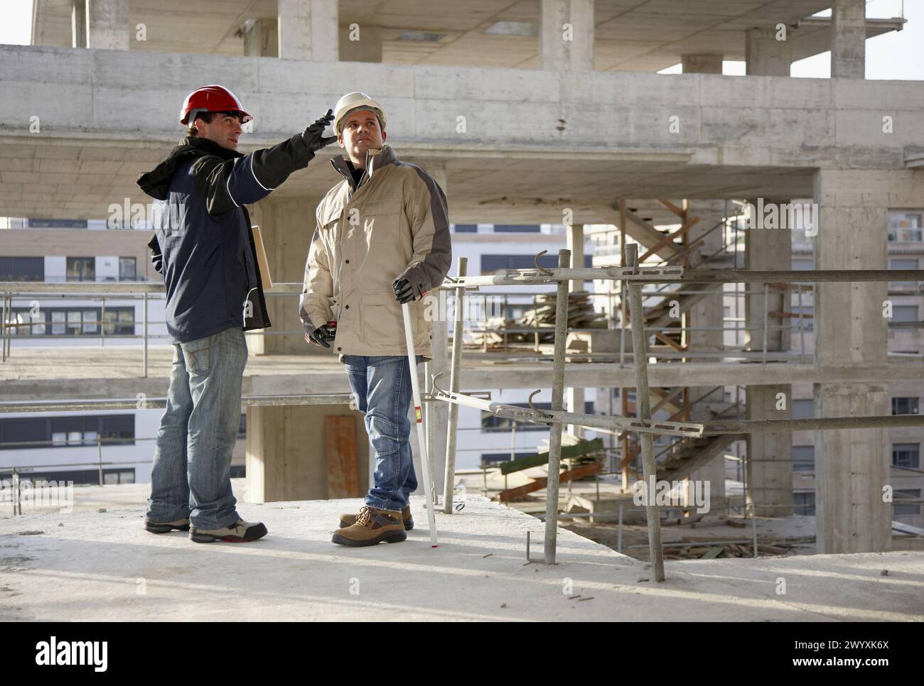 Architect and construction worker, personal protective equipment ...