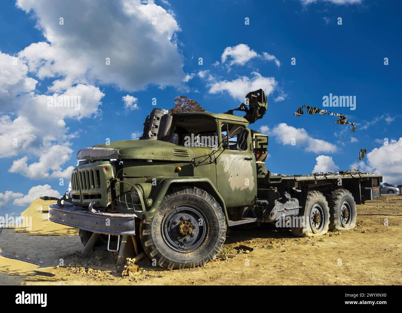 A damaged military truck on the battlefield. military technics Stock ...