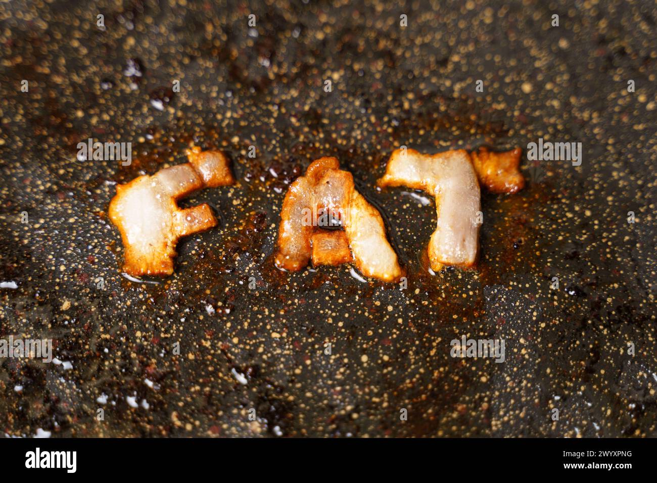 Three cheese letters spell out the word FAT, bubbling and browning as ...