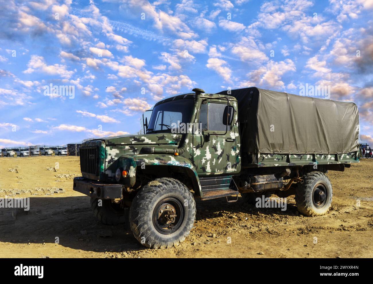 A damaged military truck on the battlefield. military technics Stock ...