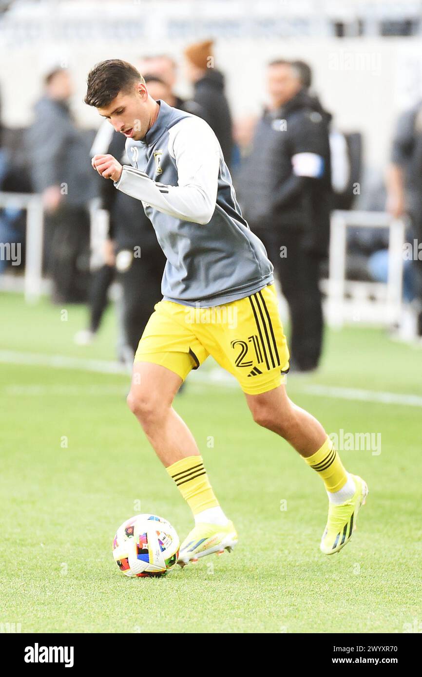April 6, 2024: Columbus Crew defender Yevhen Cheberko (21) warms up ...