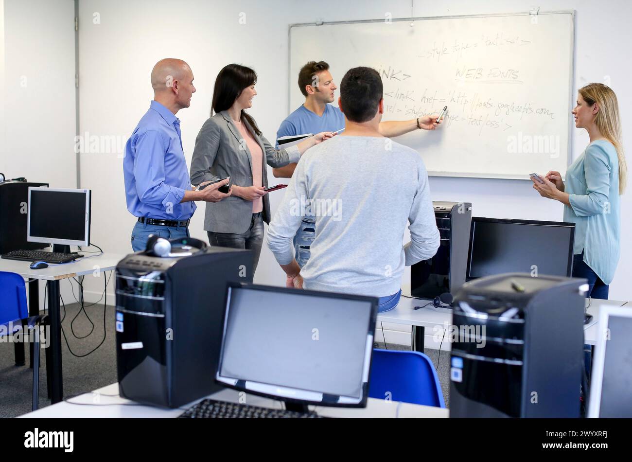 Group of teachers. Computer Academy Stock Photo - Alamy