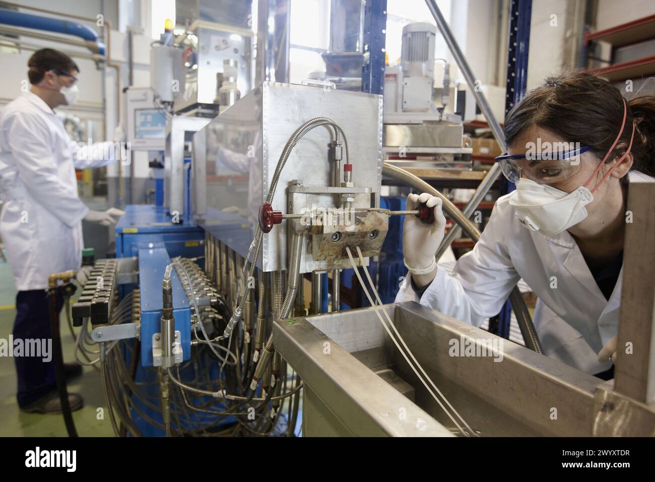 Plastic extruder, Materials Research, process in which raw plastic ...