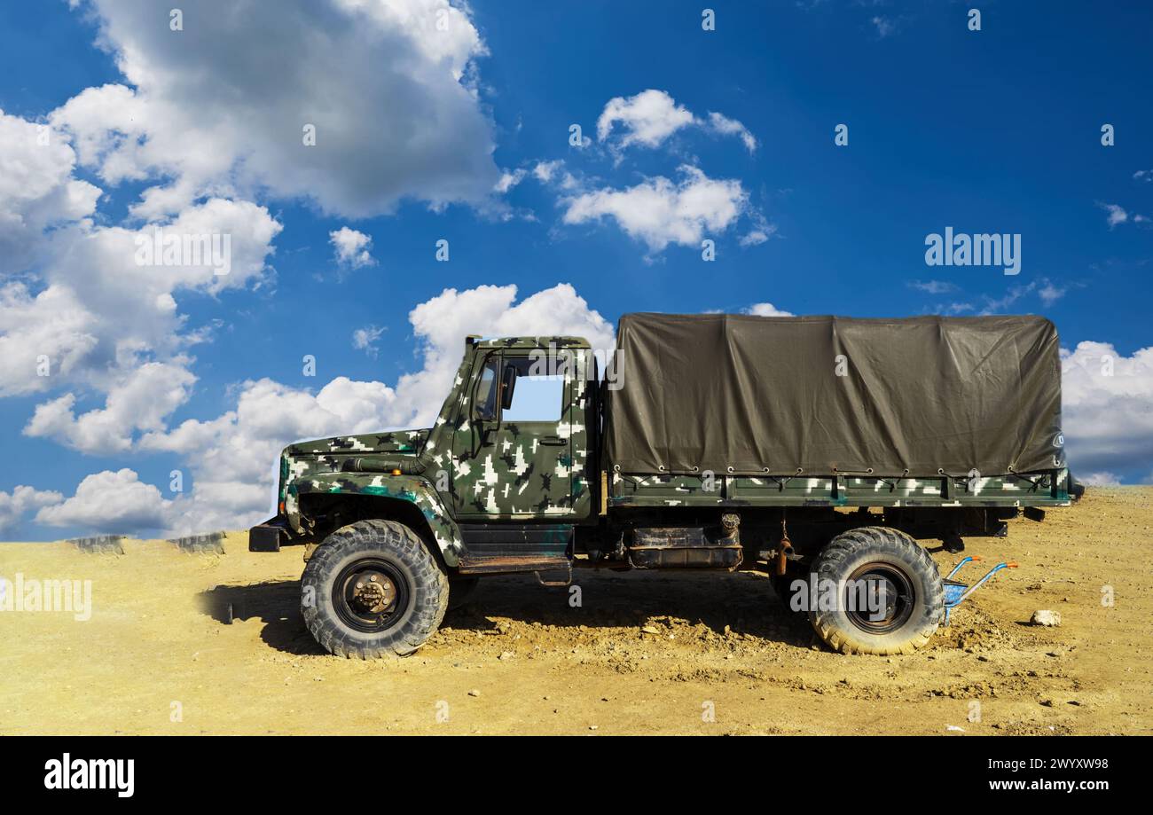 A damaged military truck on the battlefield. military technics Stock ...