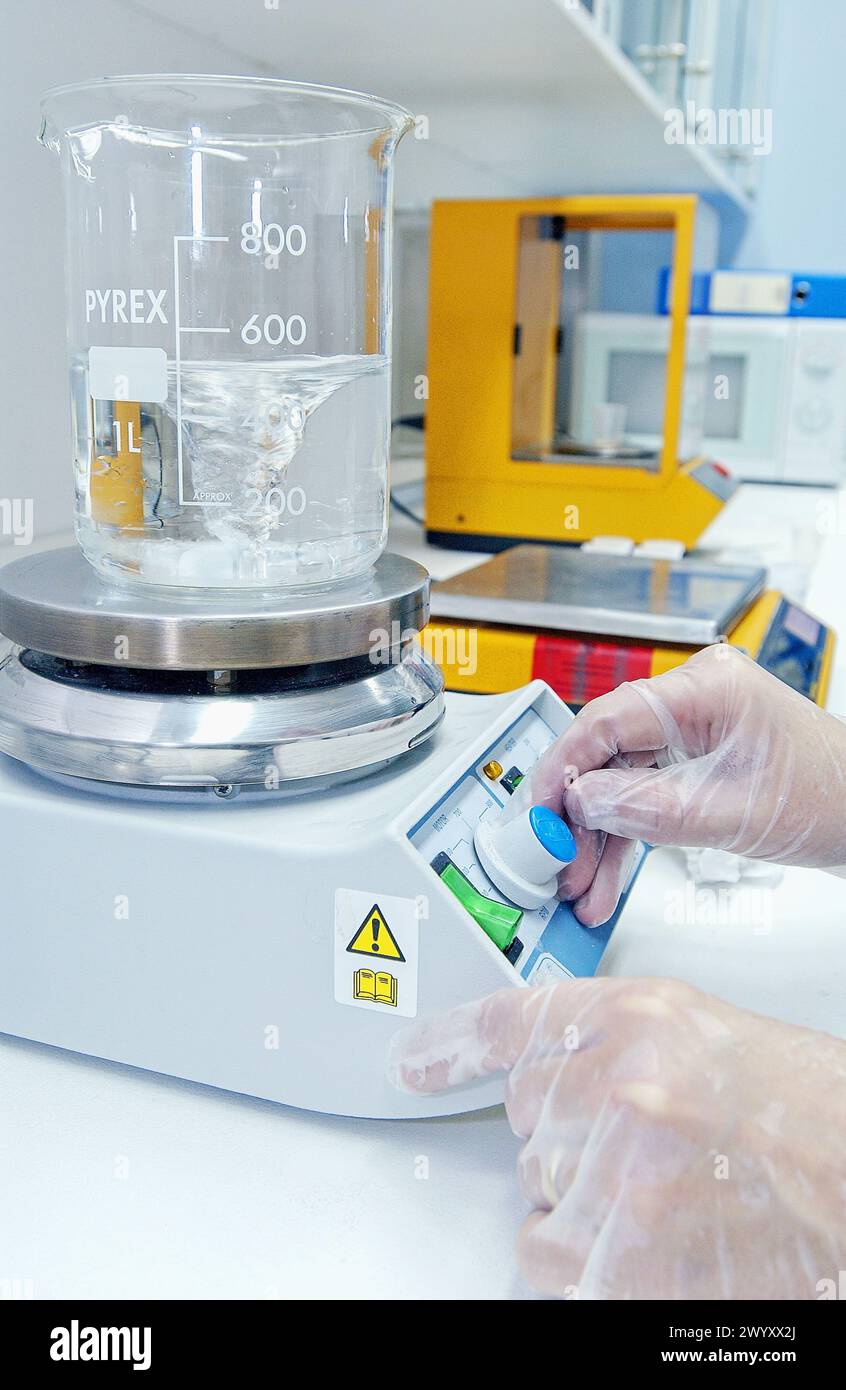 Preparing medicine at chemist of hospital Stock Photo - Alamy