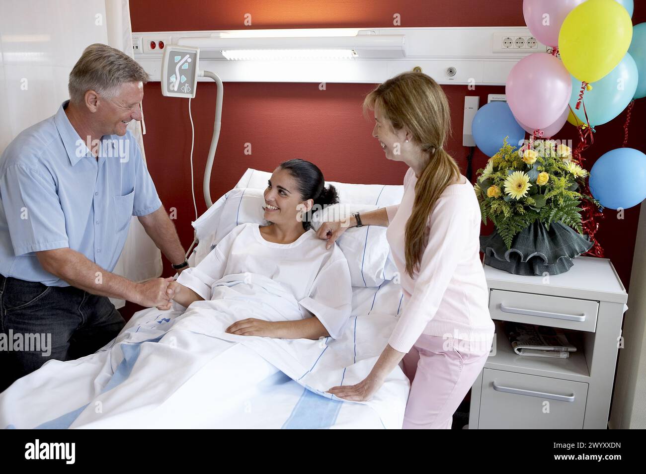 Patient and relatives in hospitalization Stock Photo - Alamy