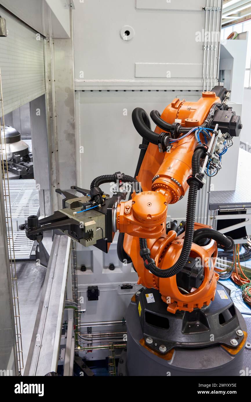 Robot in tool warehouse,. Construction of machine tools, machining ...