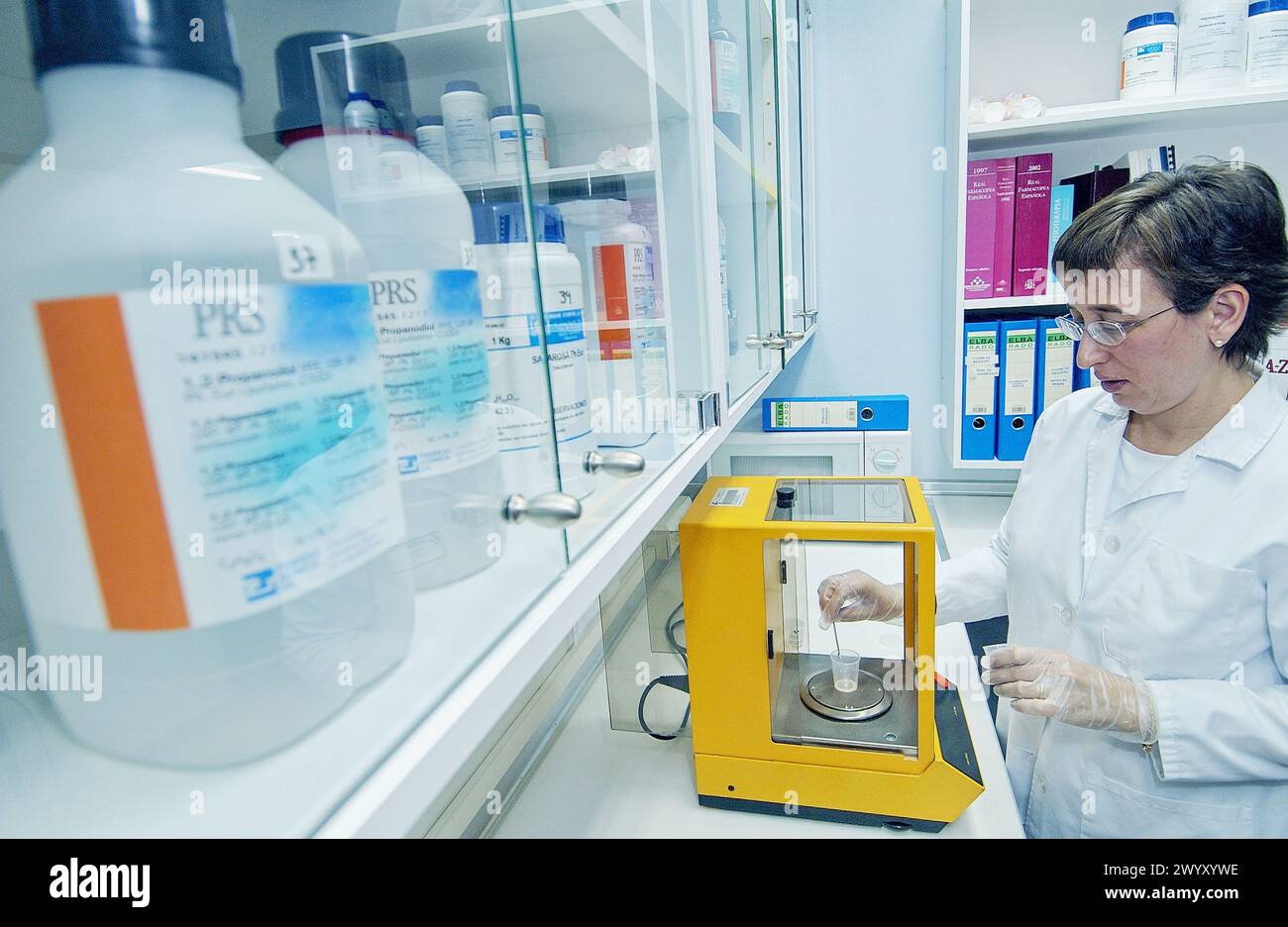 Preparing medicine at chemist of hospital with a precision scale Stock ...