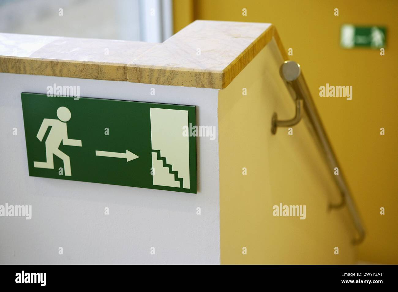 Emergency exit sign, stairs Stock Photo - Alamy