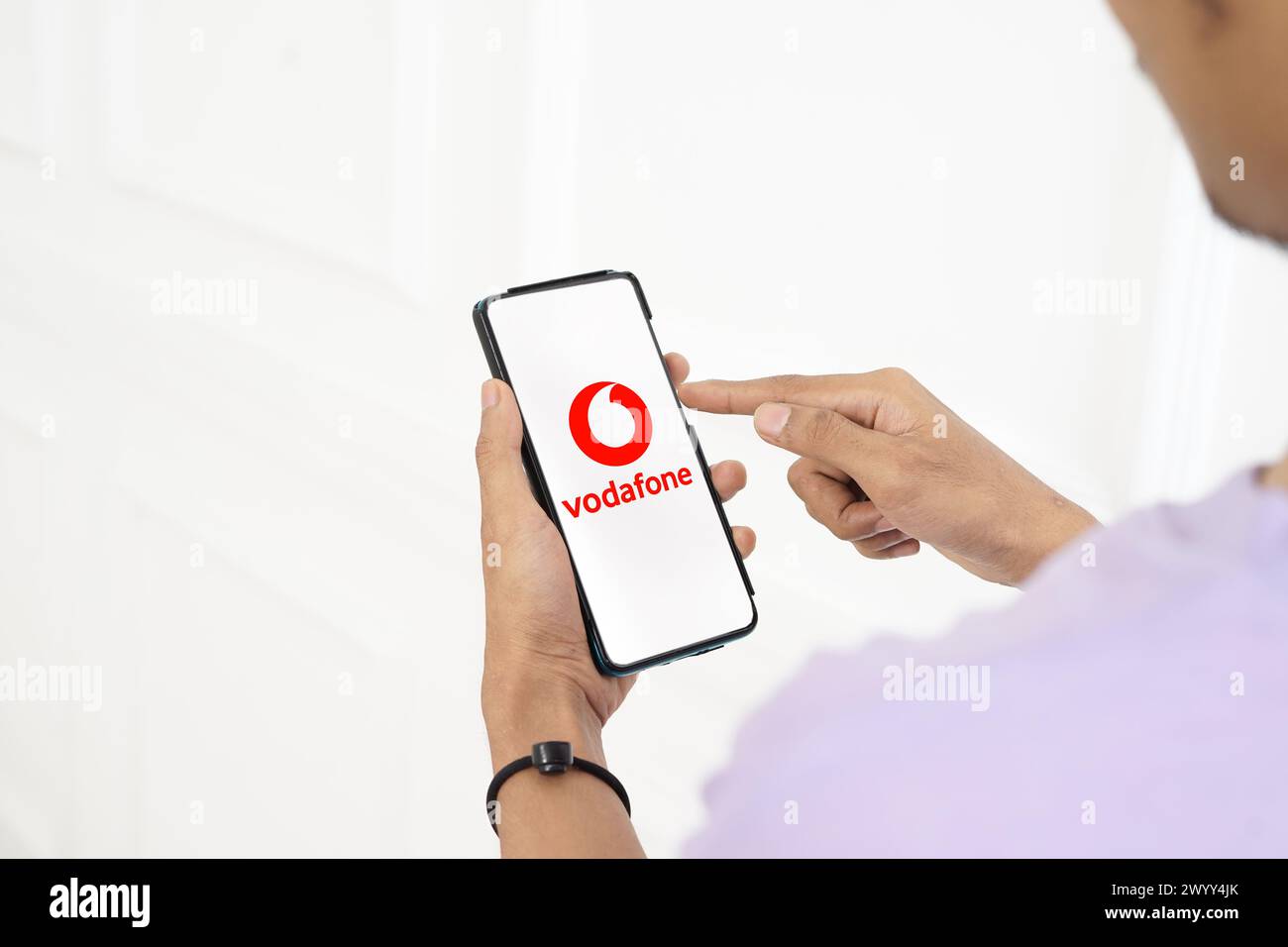 This photo illustration shows the logo of a multinational ...