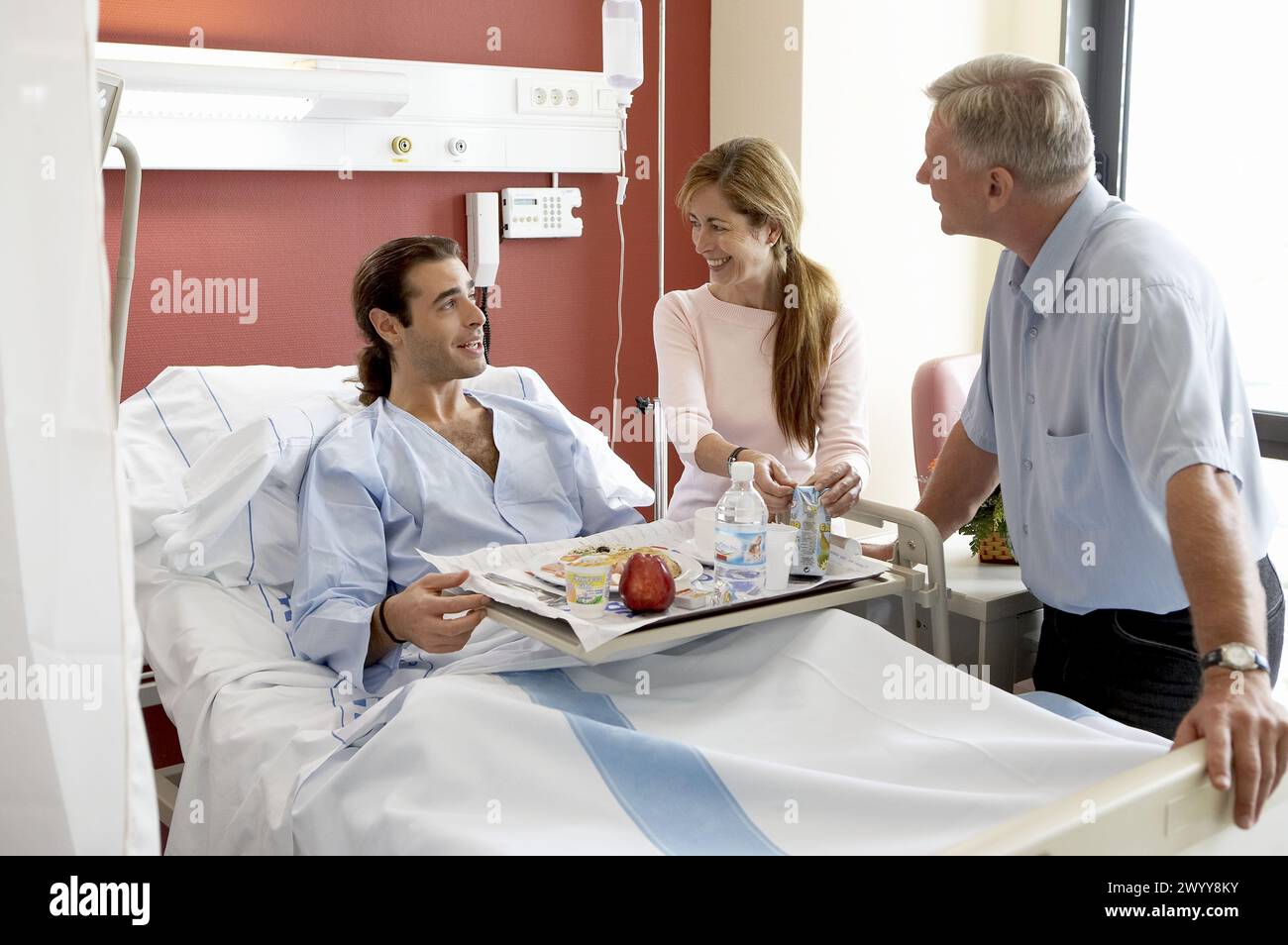 Relatives bed patient hospital hi-res stock photography and images - Alamy