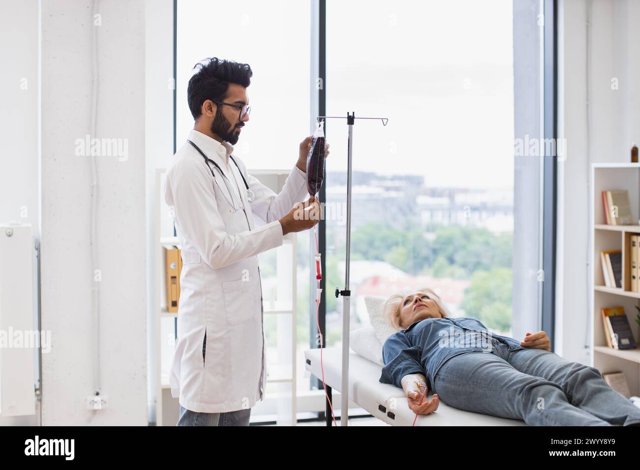 Medical specialist checking system before procedure of patient in exam ...