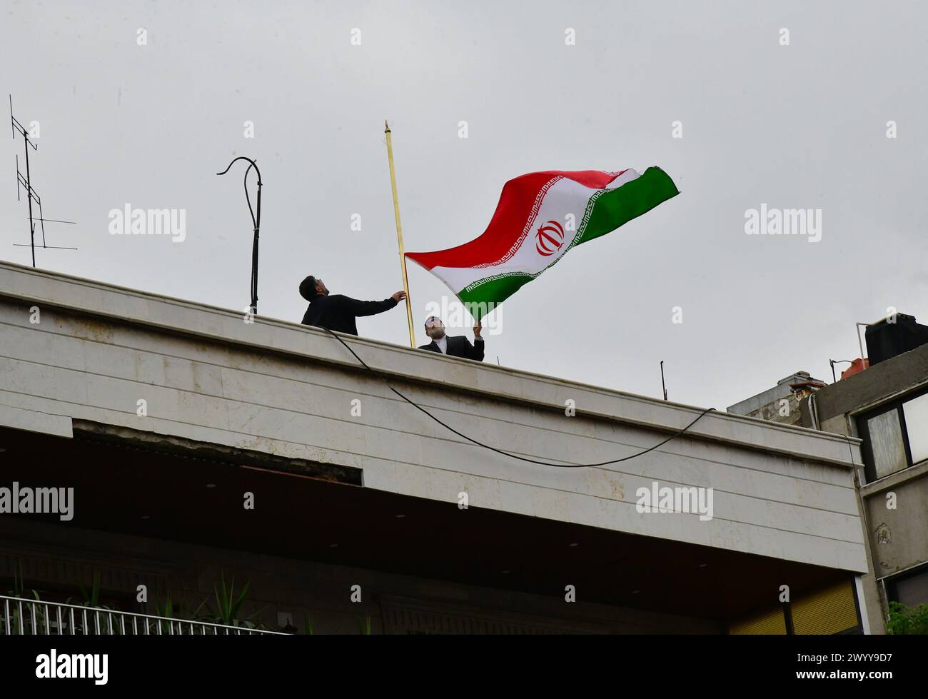 Damascus, Syria. 8th Apr, 2024. The Iranian flag is raised over the new ...