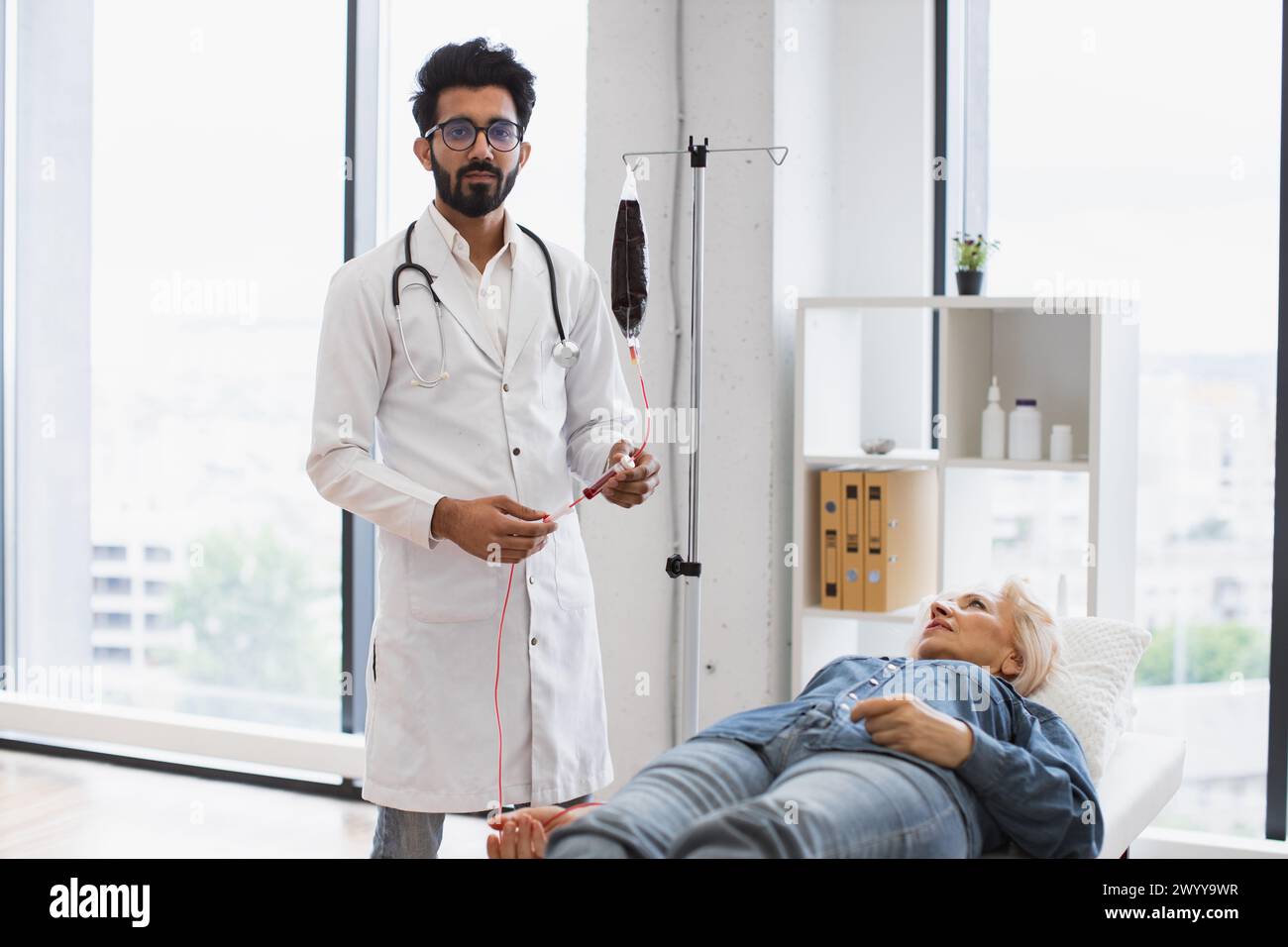 Medical specialist checking system before procedure of patient in exam ...