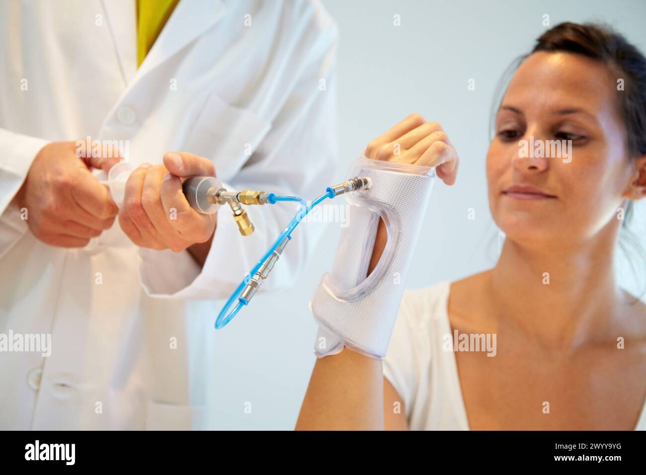 Researcher placing a patient splint prototype built with variable ...