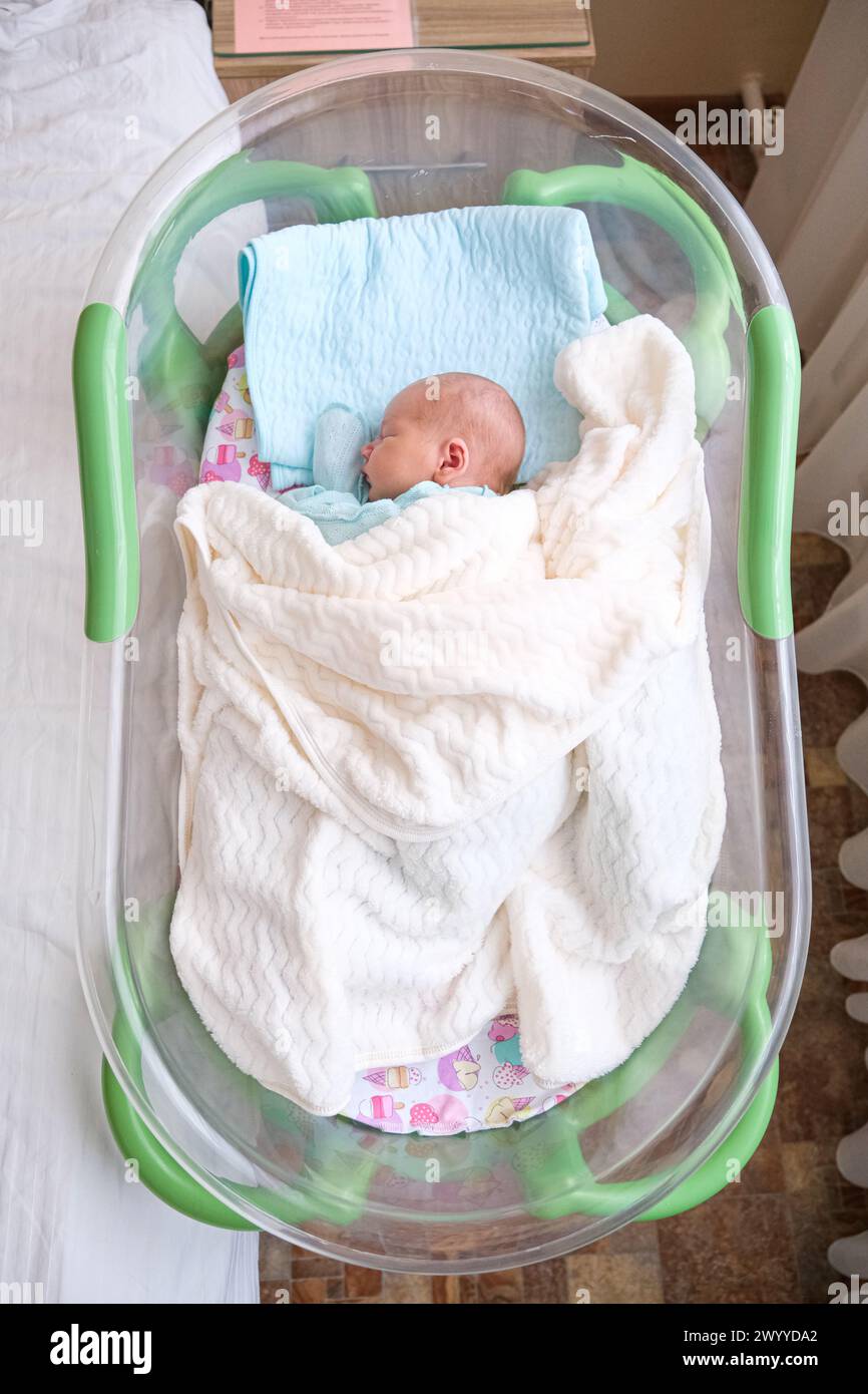 Newborn Baby Sleeping In Hospital Bassinet Stock Photo - Alamy