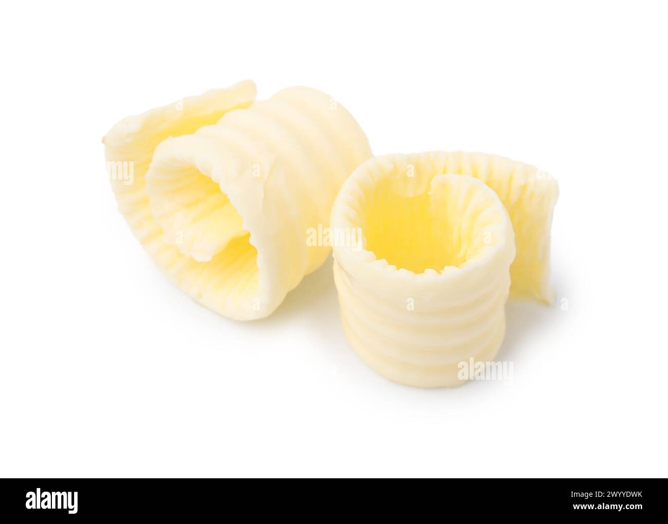 Fresh tasty butter curls isolated on white Stock Photo - Alamy