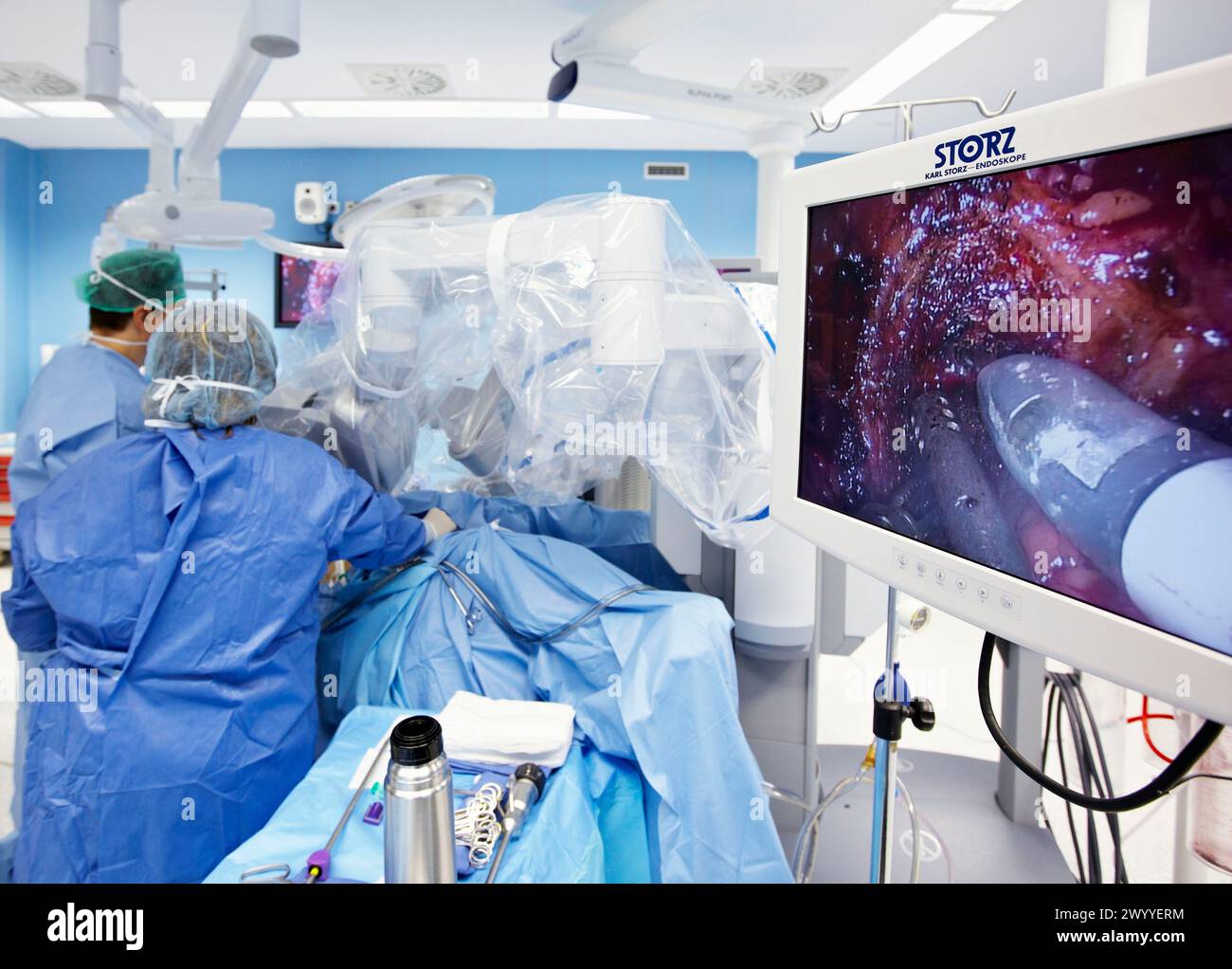 Woman surgeon operating da vinci system hi-res stock photography and ...