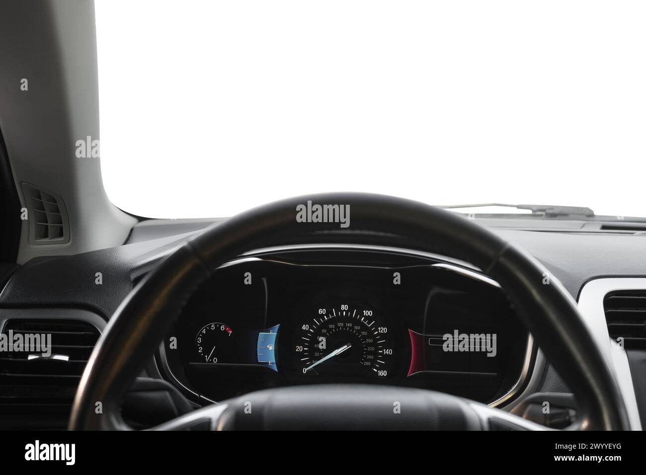 Speedometer on dashboard and steering wheel inside car Stock Photo - Alamy