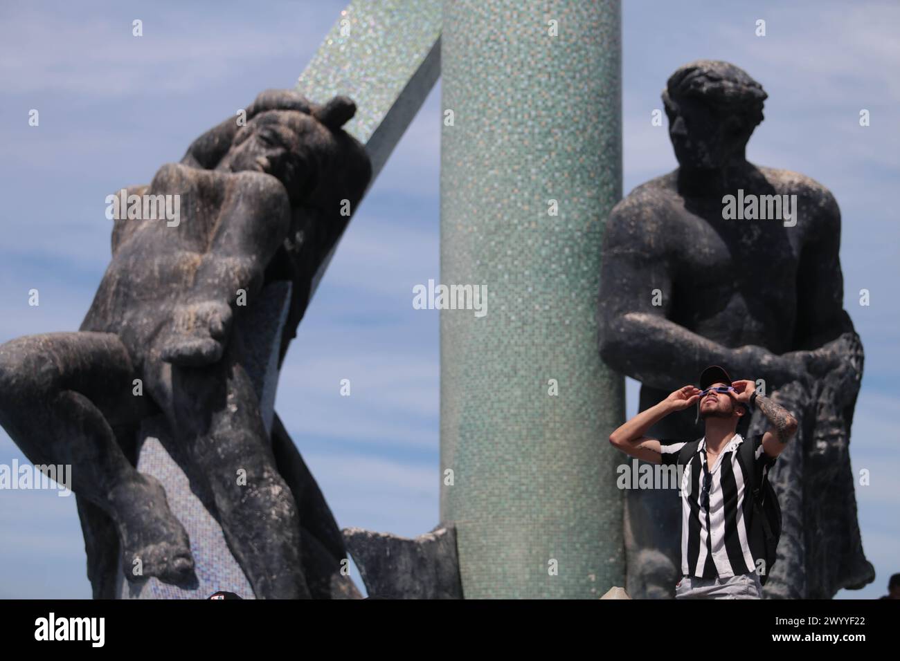 08 April 2024, Mexico, Mazatlán: People watch the total solar eclipse ...