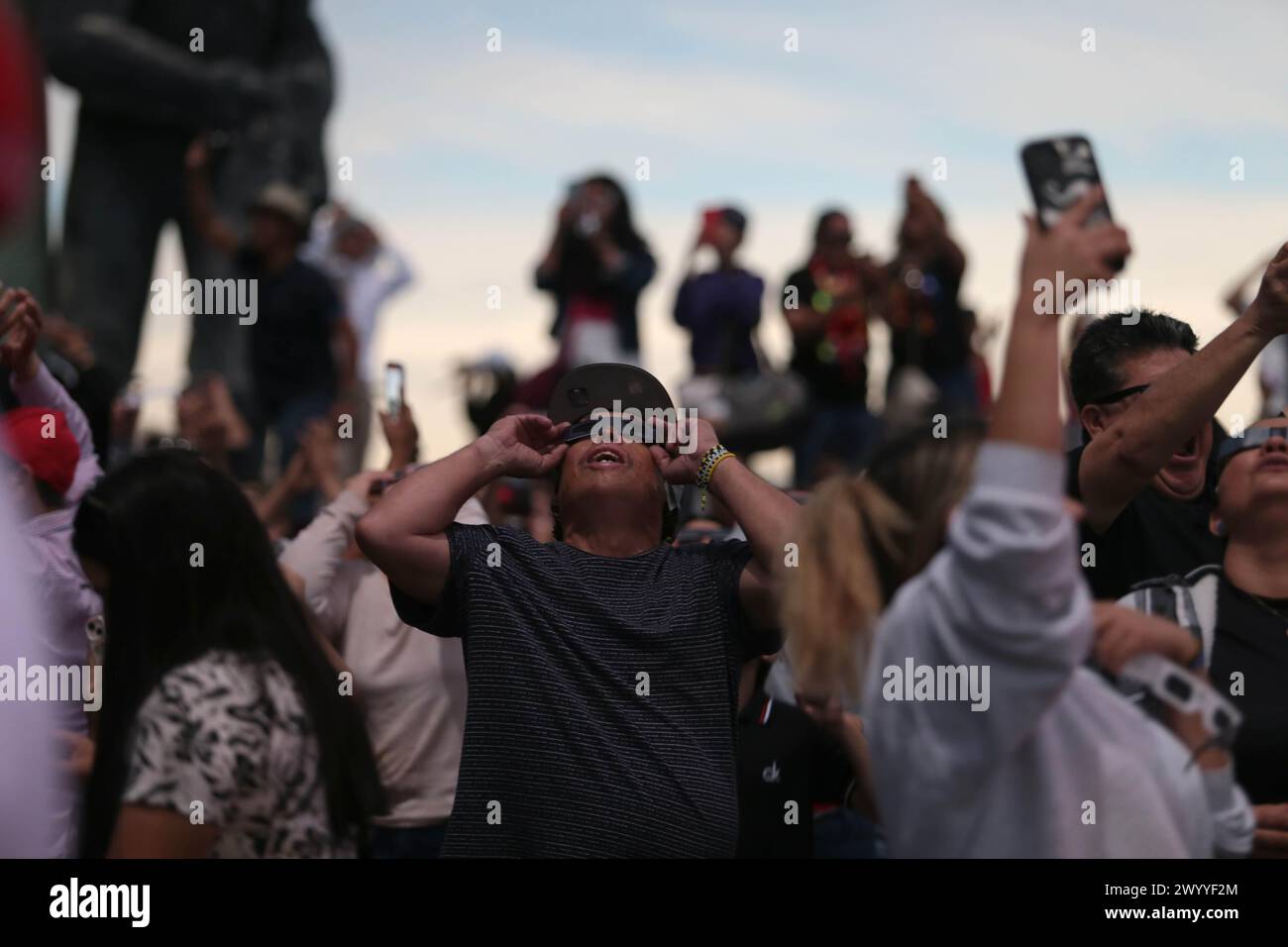 08 April 2024, Mexico, Mazatlán: People watch the total solar eclipse ...