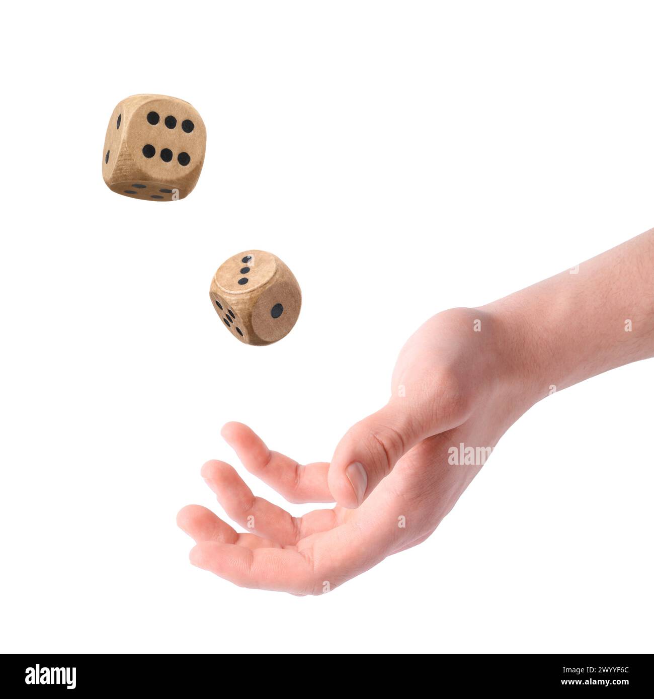 Man throwing wooden dice on white background, closeup Stock Photo - Alamy
