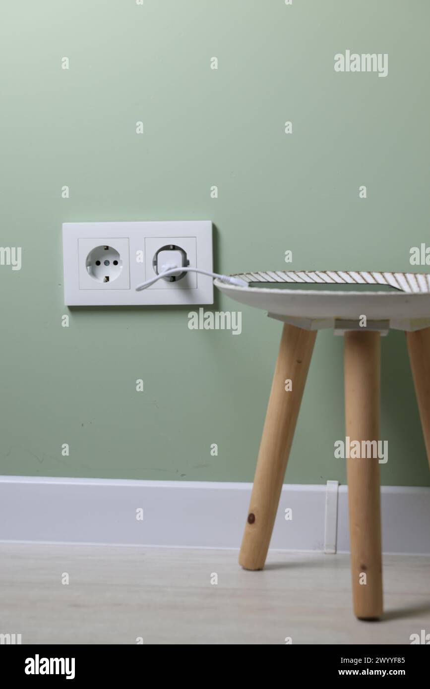 Phone plugged into socket hi-res stock photography and images - Alamy