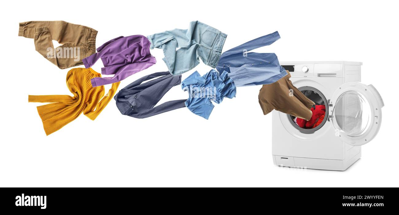 Washing machine and flying clothes on white background Stock Photo - Alamy