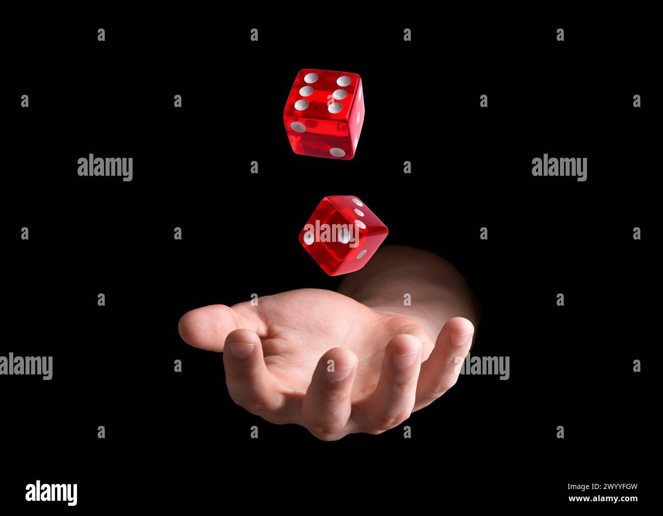 Man throwing red dice on black background, closeup Stock Photo - Alamy