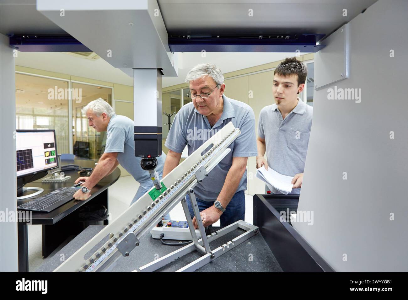 The SAT team calibrating three-dimensional machine. Calibration of CMM ...