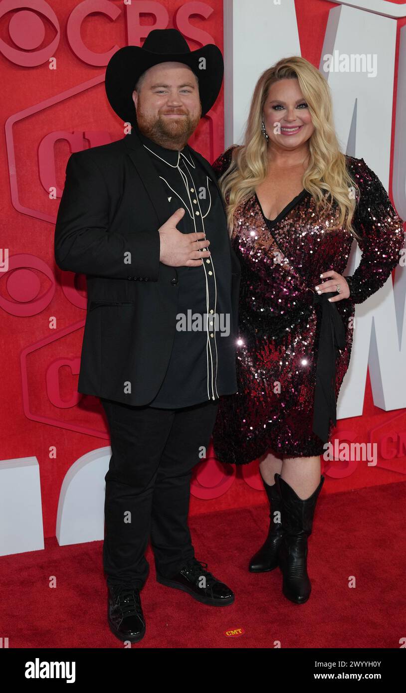 Paul Walter Hauser, Amy Elizabeth Boland attend the 2024 CMT Music ...