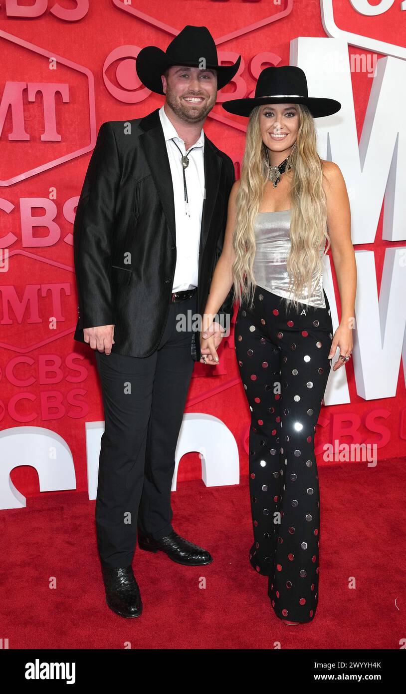 Devlin "Duck" Hodges and Lainey Wilson attend the 2024 CMT Music Awards ...