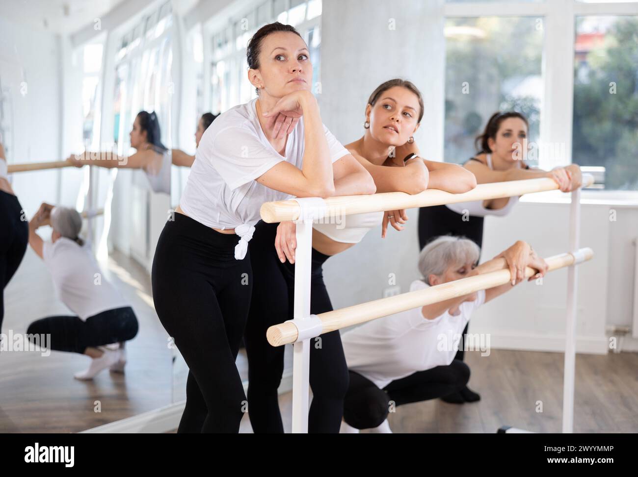 Women of different ages relaxing after ballet class Stock Photo - Alamy