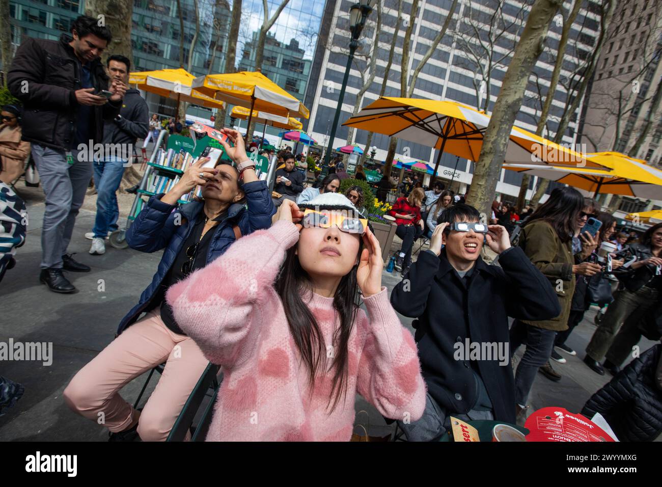 Crowds gather in Bryant Park, in midtown, Manhattan, to watch the ...