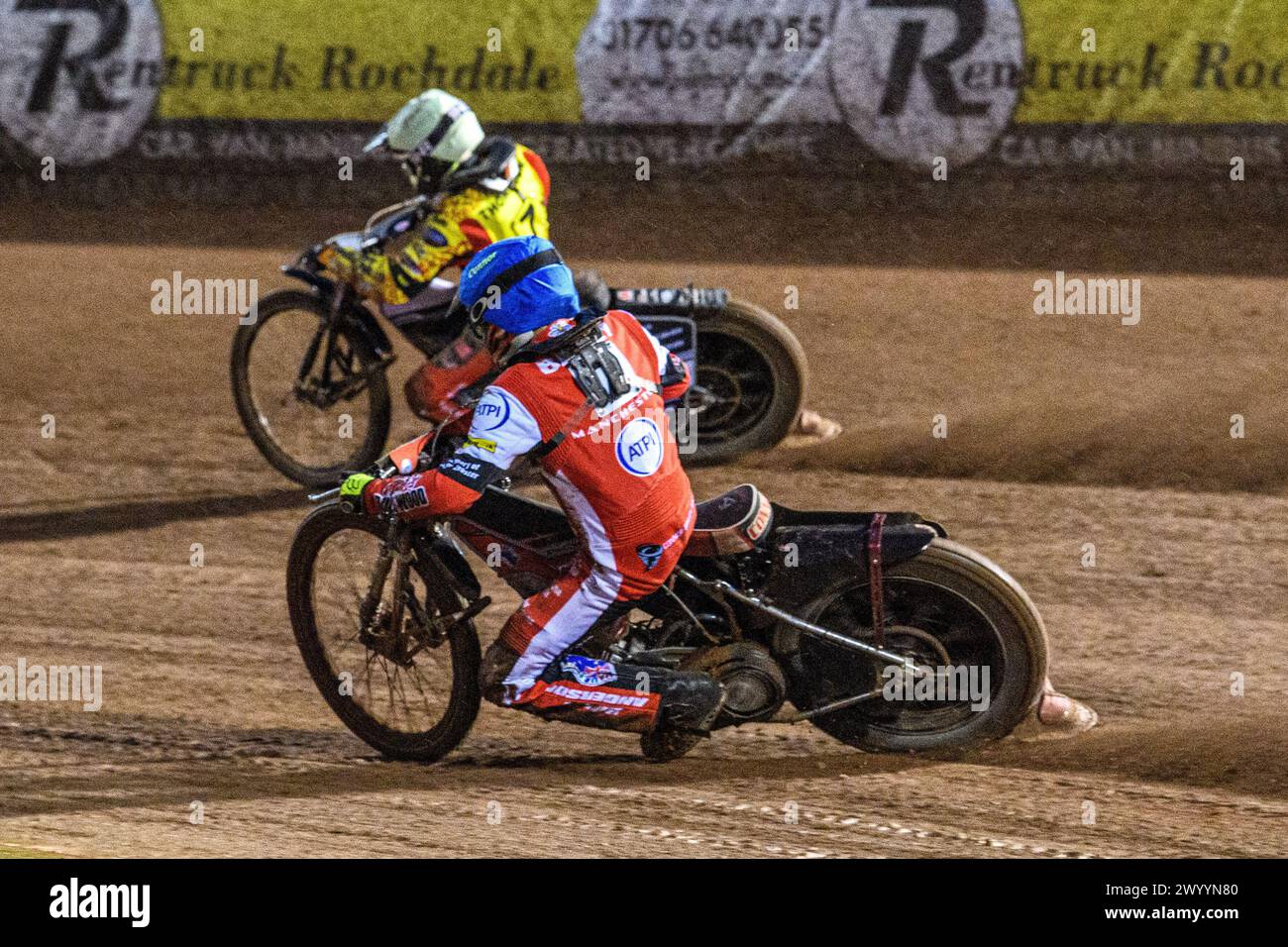 Connor Bailey of Belle Vue Aces in Blue chases l;ly in Yellow during ...