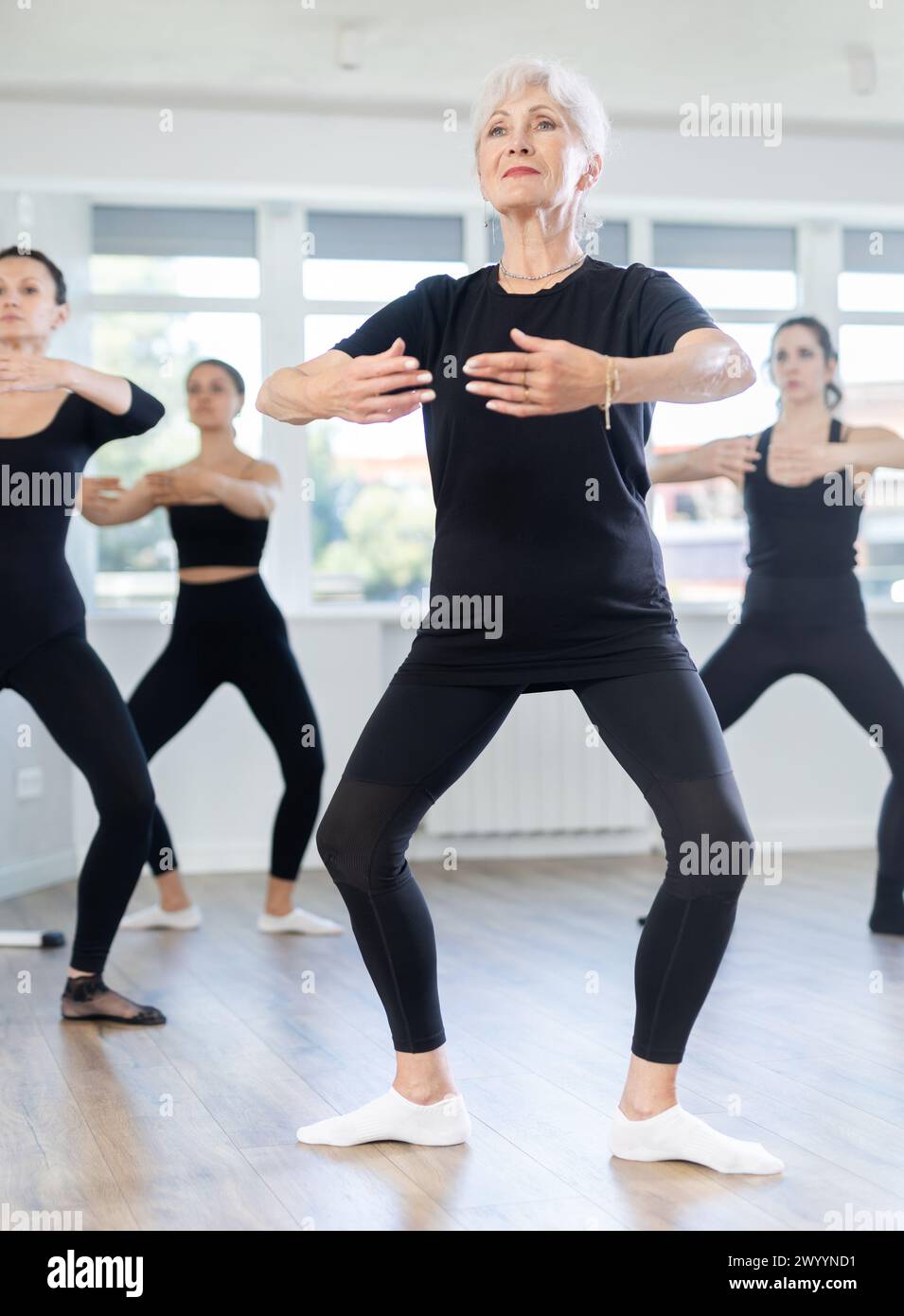 Ballet dancer exercising grand plie hi-res stock photography and images ...