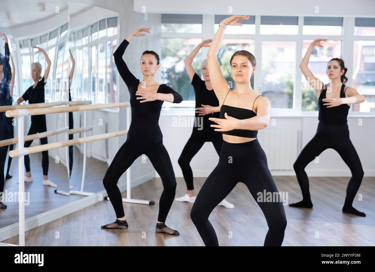 Ballet dancer exercising grand plie hi-res stock photography and images ...
