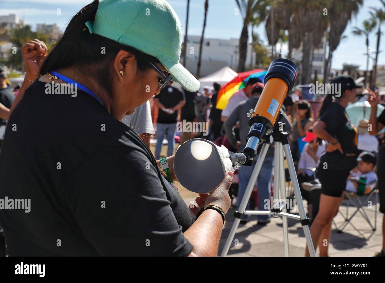Mazatlan, Mexico. 08th Apr, 2024. A woman observes the solar eclipse ...
