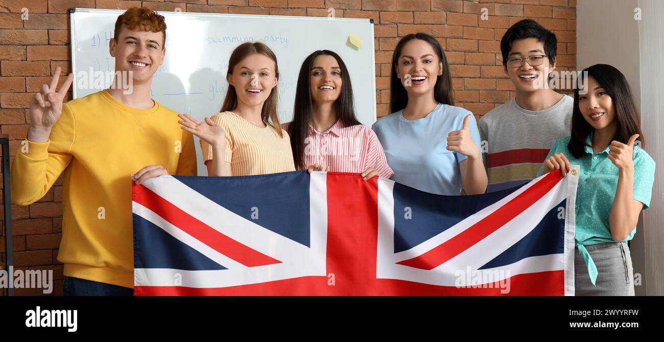 Young students with UK flag at language school Stock Photo - Alamy
