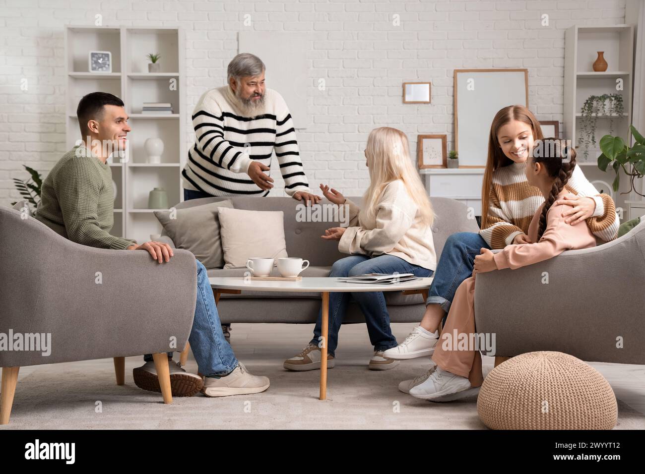 Big family chatting at home Stock Photo - Alamy
