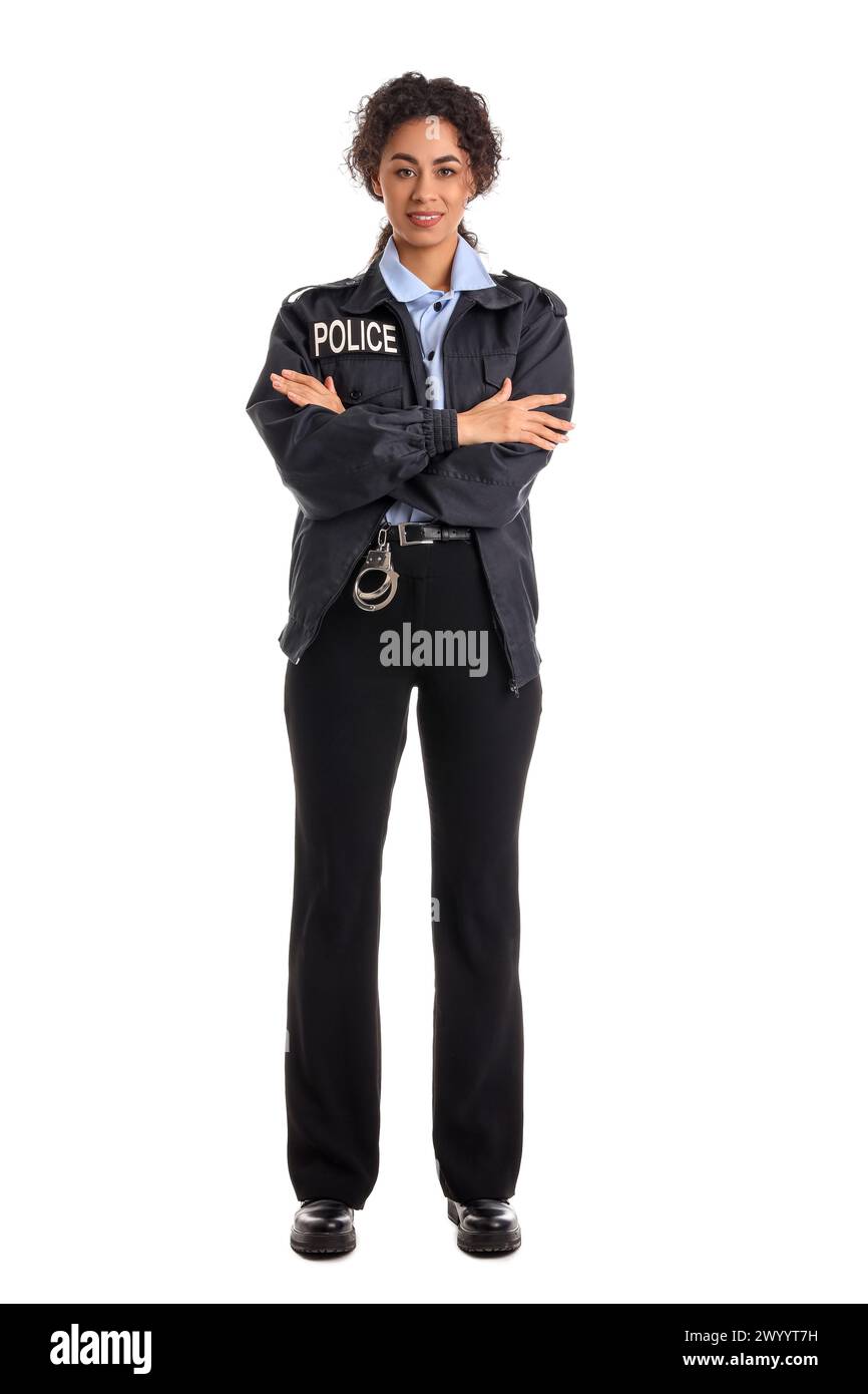 African-American female police officer with crossed arms on white ...