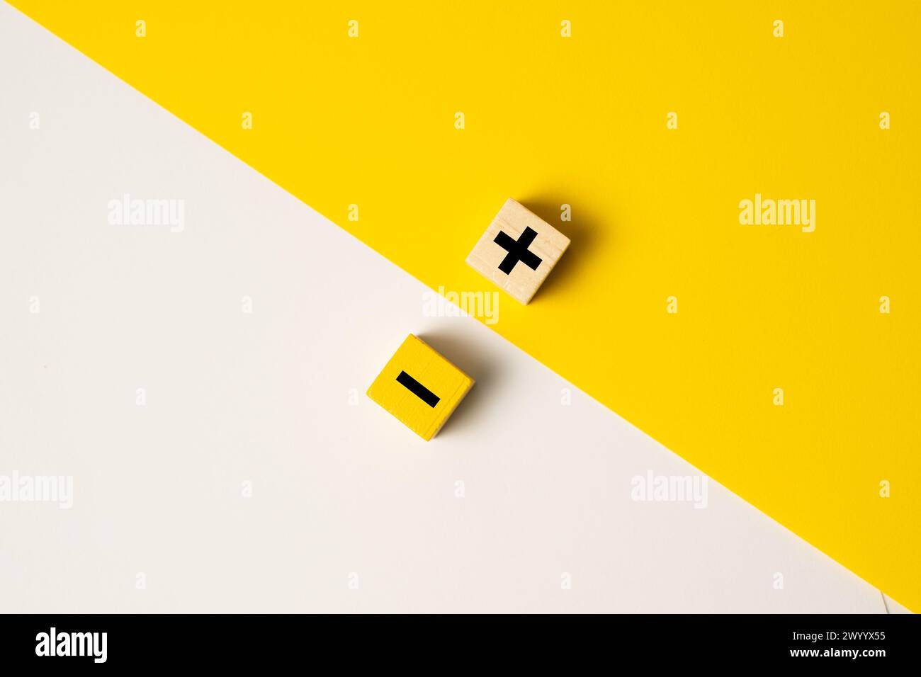 The concept of opposites or pros and cons using plus and minus signs ...